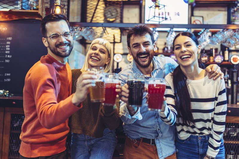 Young Friends Drinking Craft Beer in Pub Stock Photo - Image of ...