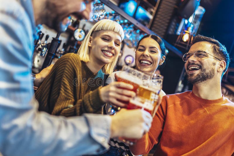 Young Friends Drinking Craft Beer in Pub Stock Image - Image of ...