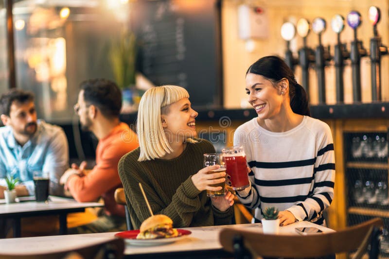 Young Friends Drinking Craft Beer in Pub Stock Image - Image of ...