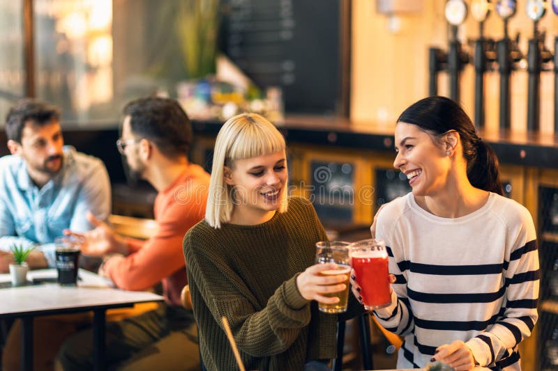 Young Friends Drinking Craft Beer in Pub Stock Image - Image of alcohol ...