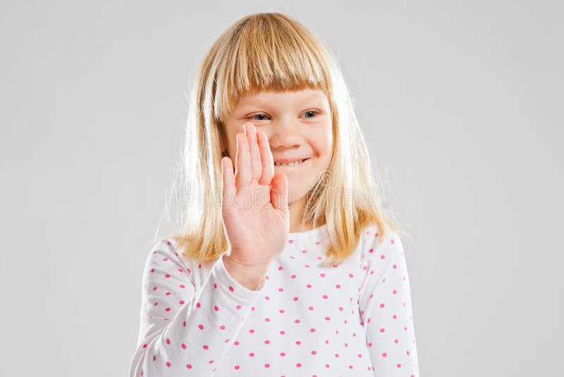 Smiling Young Girl Showing Hand Signal Stock Image - Image of innocence ...
