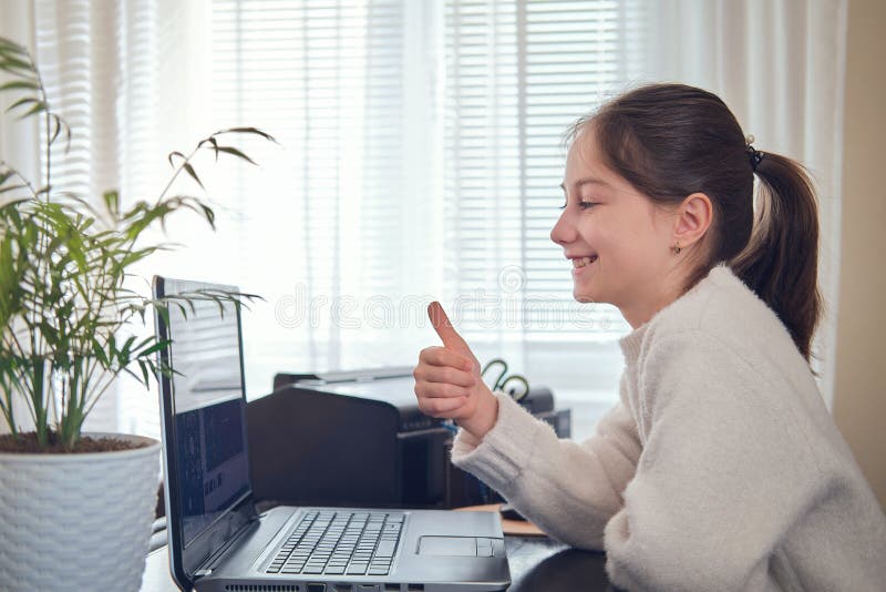 Smiling Young Girl Using Computer at Home Office Workplace Exploring ...