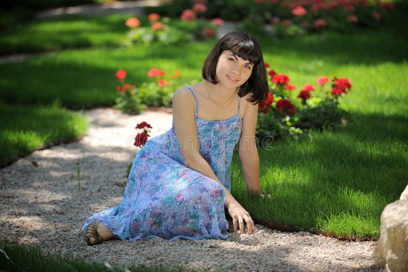 Smiling Young Lady in a Park Stock Photo - Image of attractive, outdoor ...