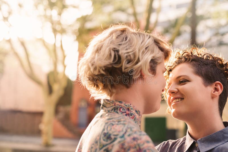 Affectionate Young Lesbian Couple Sharing A Loving Moment Together