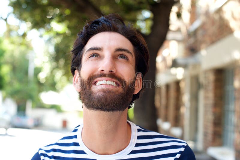 Smiling Young Man with Beard Looking Up Stock Image - Image of fresh ...