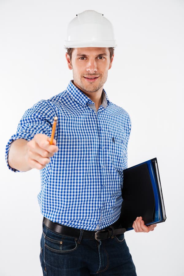 Smiling Young Man Builder in Building Helmet Pointing on You Stock ...