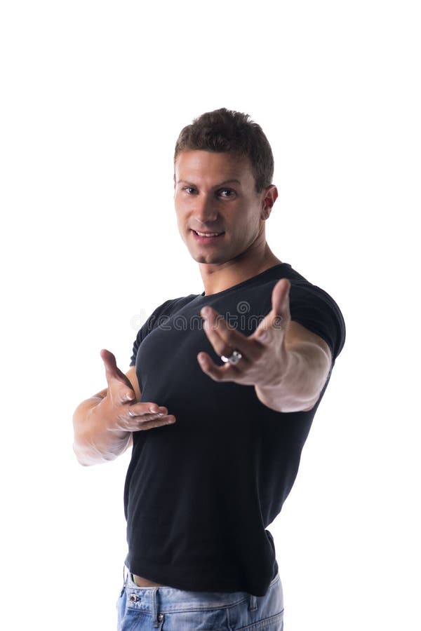 Smiling Young Man Gesturing with His Hands, Pointing Finger at You ...