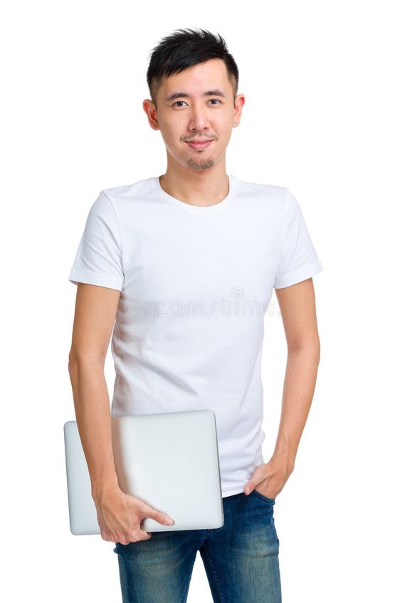 Smiling Young Man Holding Computer Stock Image - Image of person ...