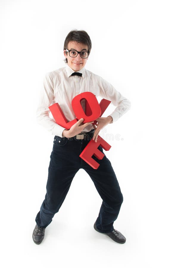 Smiling Young Man Holds a Red Letters Stock Photo - Image of human ...