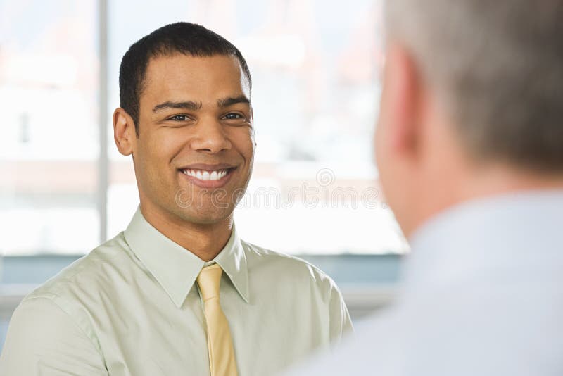 Smiling Young Man in an Interview Stock Image - Image of clean, focus ...