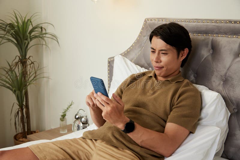 Man Texting Girlfriend stock photo. Image of device - 260363060