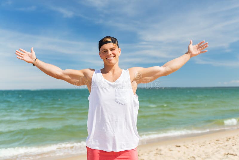 Smiling Young Man on Summer Beach Stock Image - Image of handsome ...