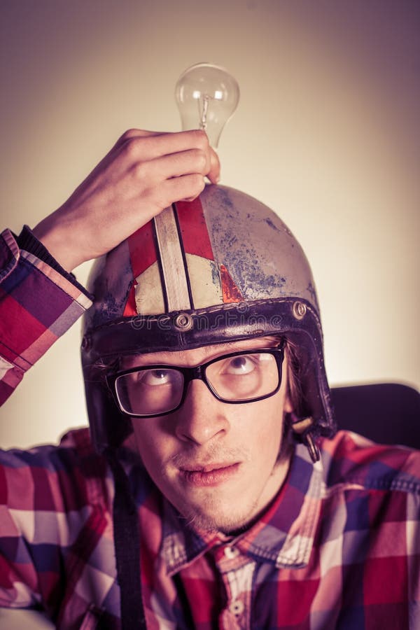 Smiling Young Nerd Holding Light Bulbs Stock Image - Image of comic ...