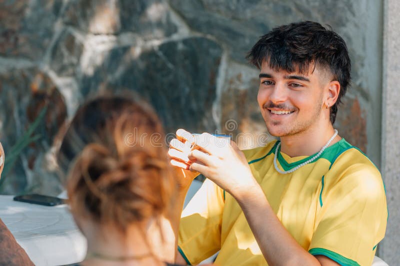 Young People Talking Together Outdoors Stock Photo - Image of time ...
