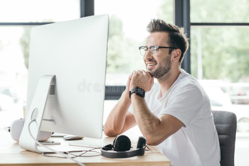 Smiling Young Programmer In Eyeglasses Using Desktop Computer Stock Image Image Of Person