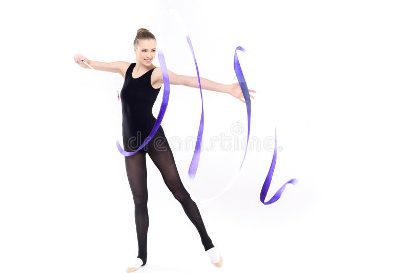 Smiling Young Rhythmic Gymnast Training with Blue Ribbon Stock Photo ...