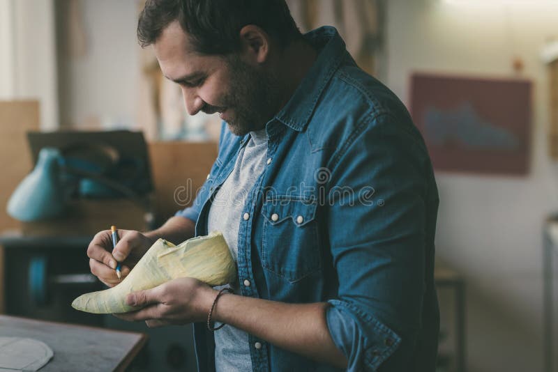 Smiling Young Shoemaker Working Stock Image - Image of person ...