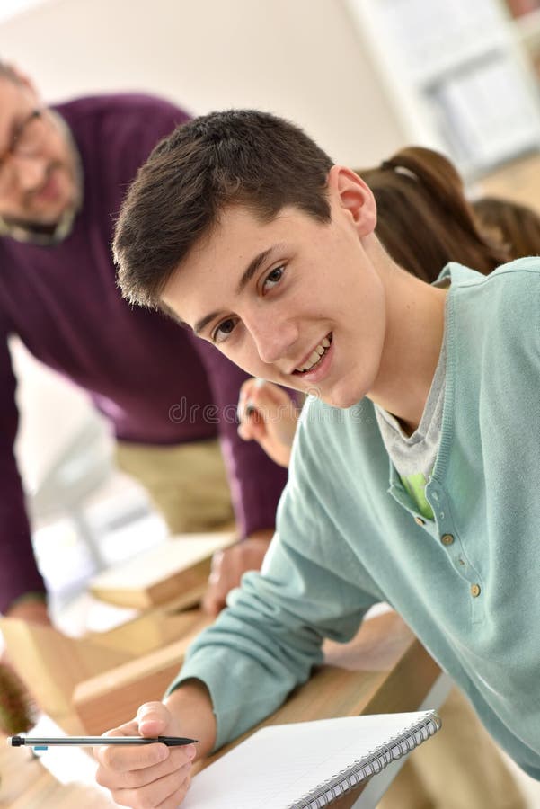 Smiling Young Student Attending Class Stock Image - Image of young ...