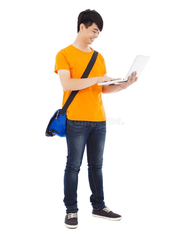 Smiling Young Student Standing and Using Laptop Stock Photo - Image of ...