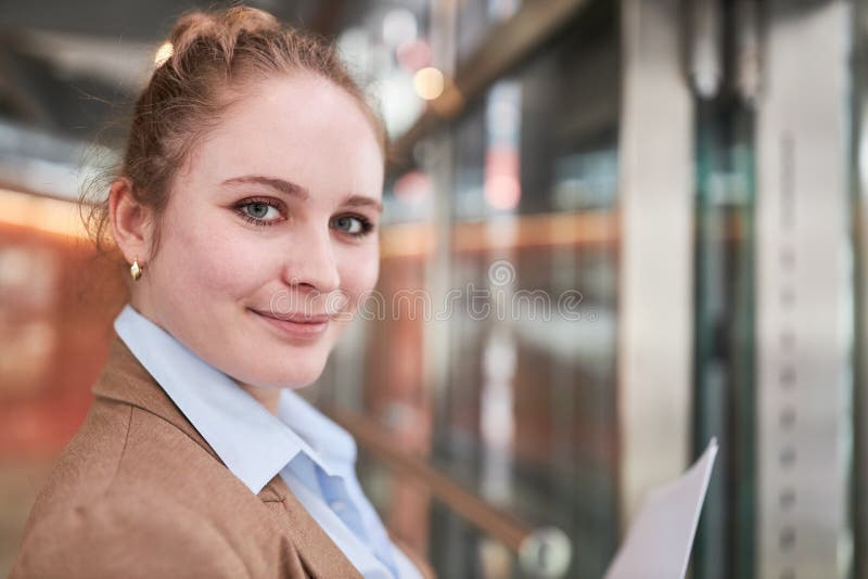 Smiling Young Woman As a Business Trainee or Student Stock Photo ...