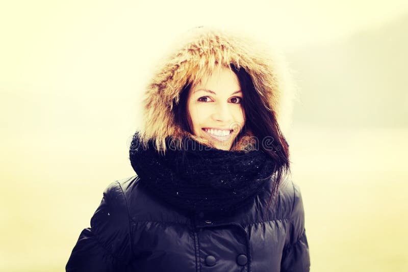 Smiling Young Woman in Cold Day Stock Photo - Image of hood, smile ...