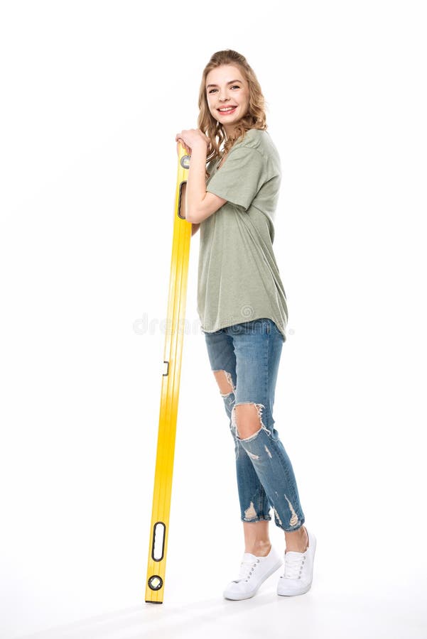 Smiling Young Woman Posing with Level Tool Isolated on White Stock ...