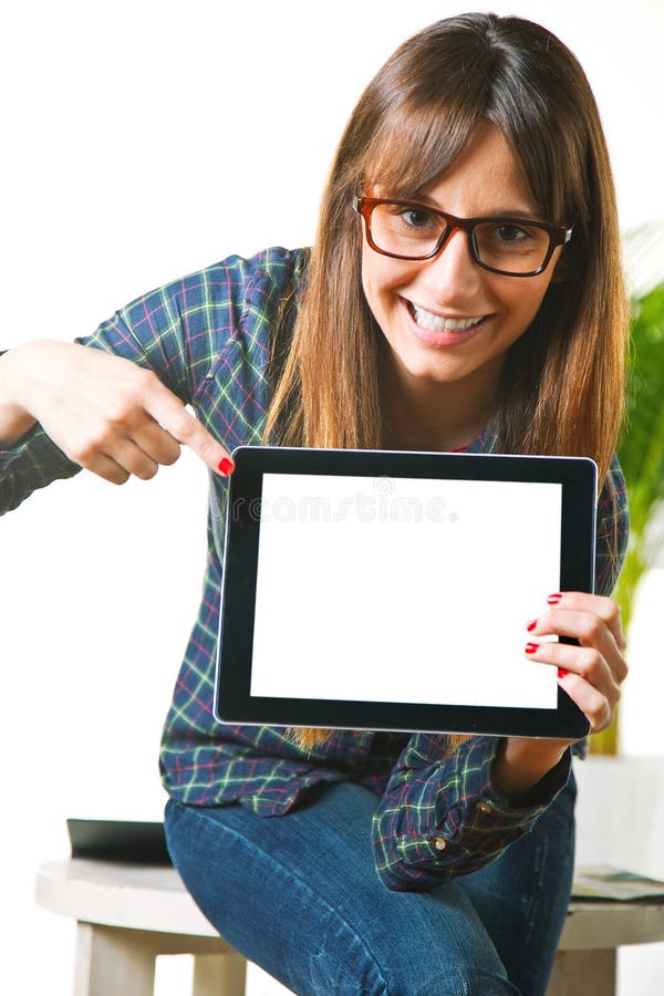 Smiling Young Woman Showing a Tablet Stock Image - Image of office ...