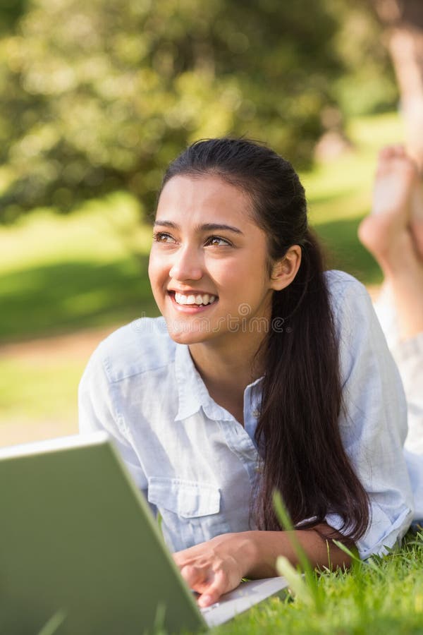 Smiling Young Woman Using Laptop in Park Stock Image - Image of leisure ...