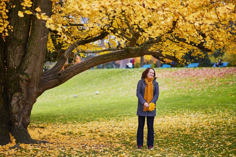 Woman Walking in Park on a Bright Fall Day Stock Photo - Image of human ...