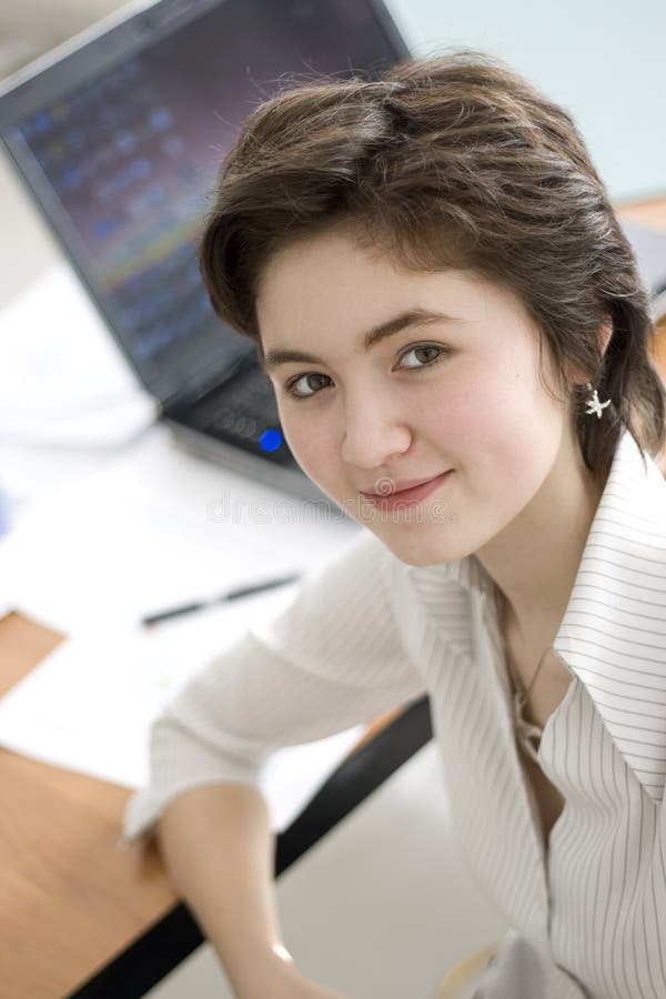 Smiling Young Woman Working at Office Stock Image - Image of phone ...
