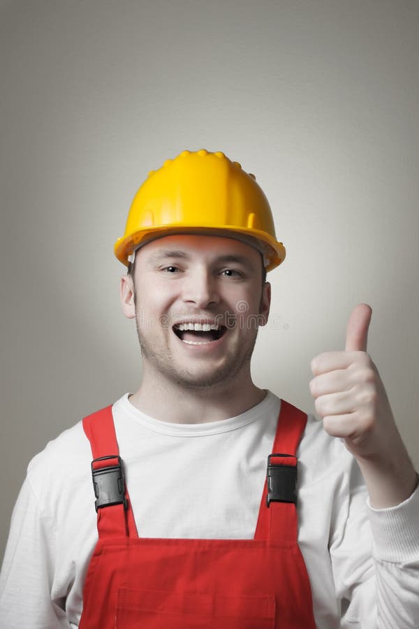 Smiling young worker stock photo. Image of industrial - 32286610
