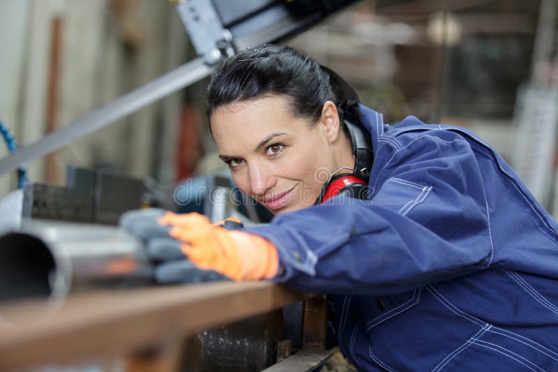 Smily Woman Working with Machine in Industrial Stock Image - Image of ...