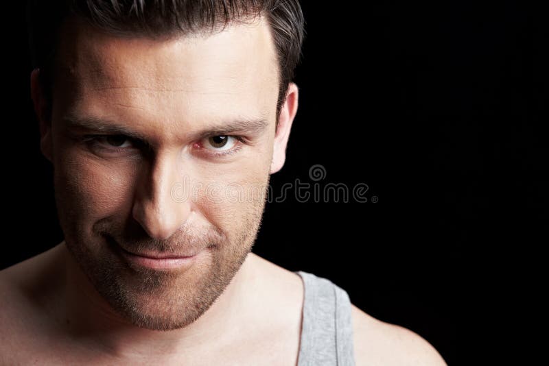 Smirkingly smiling man stock image. Image of copy, dark - 179740691