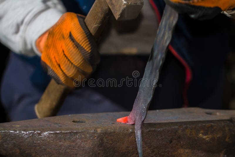 Smith forging hot iron stock photo. Image of anvil, shiny - 36697770