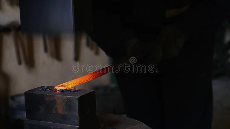 The Smith Processes the Hot Iron on the Machine Stock Video - Video of ...