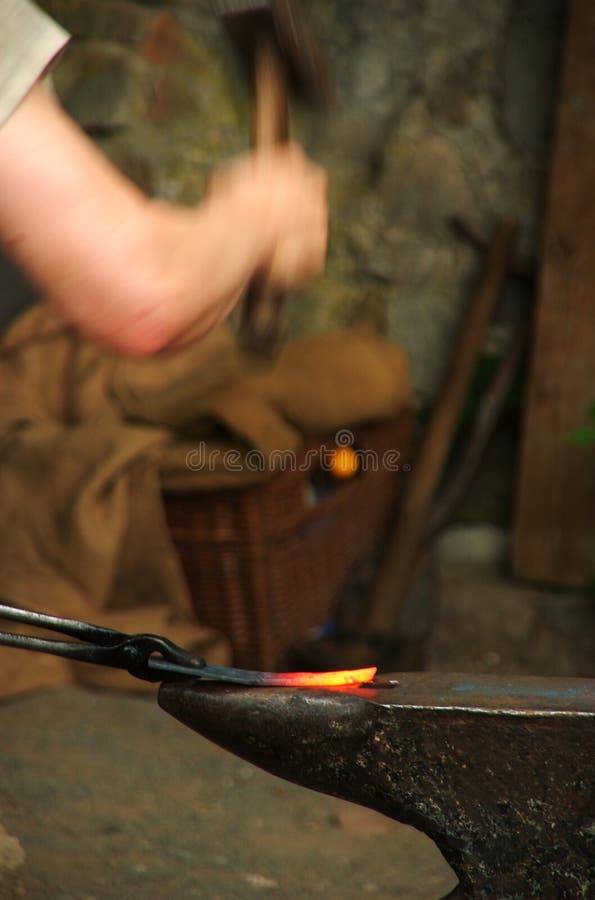 Blacksmith Hammering Hot Metal Stock Image - Image of forge, anvil ...