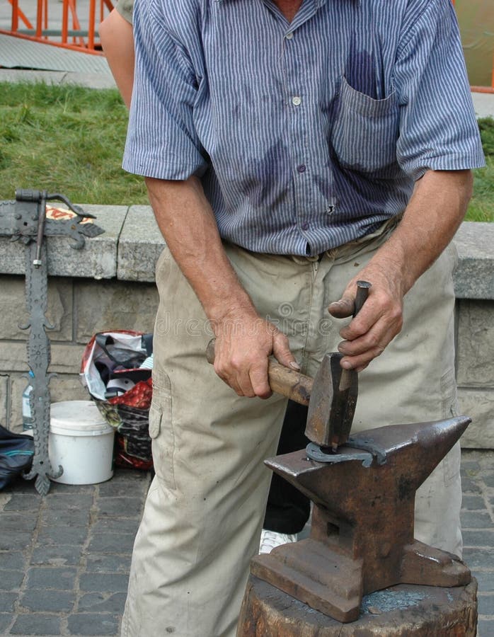 Smith at Work stock photo. Image of hammering, metal, workshop - 25454
