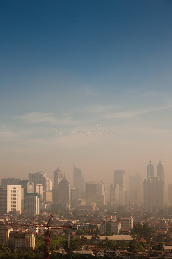 Smog Dome Over a Polluted City Stock Photo - Image of skyline, jakarta ...