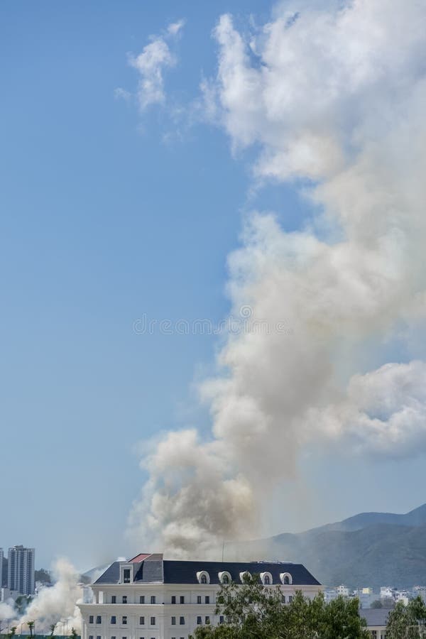 Smoke around the building stock image. Image of building - 192282613