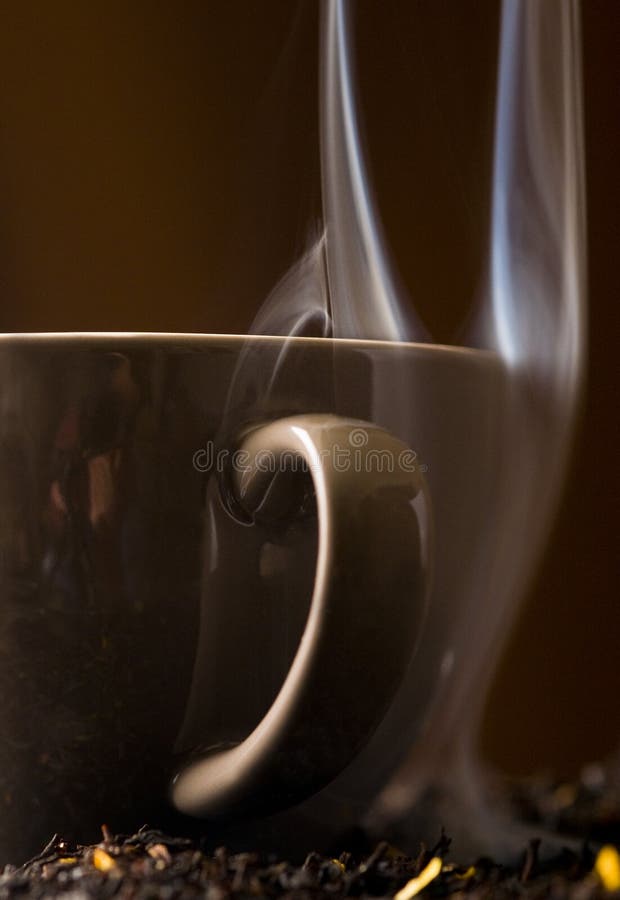 Smoke around cup of tea stock image. Image of cafe, taste - 24080717