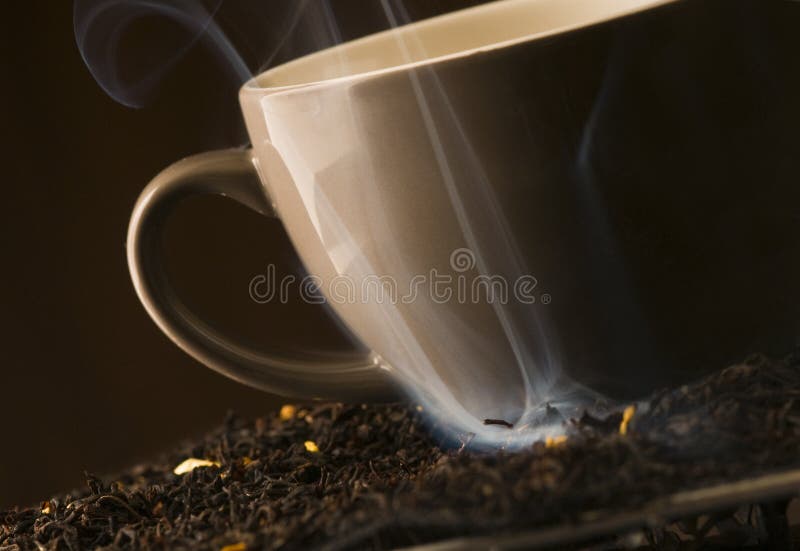 Smoke around cup of tea stock photo. Image of store, restaurant - 24080738