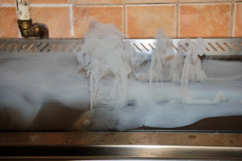 Smoke Billows from a Wood Stove Stock Photo - Image of industrial ...