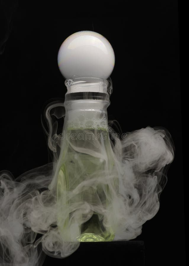 Smoke Bubbles Bursting Creating Unique Shapes and Patterns Around Small ...