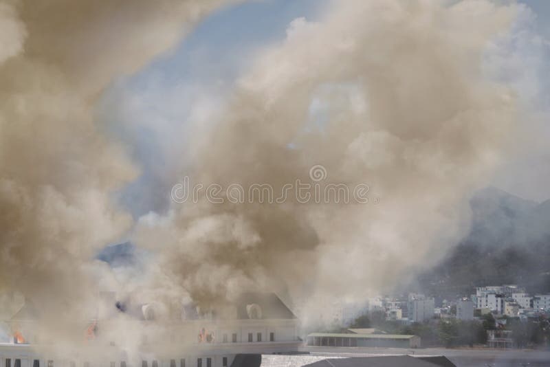 Smoke above building stock photo. Image of damage, flame - 192282618