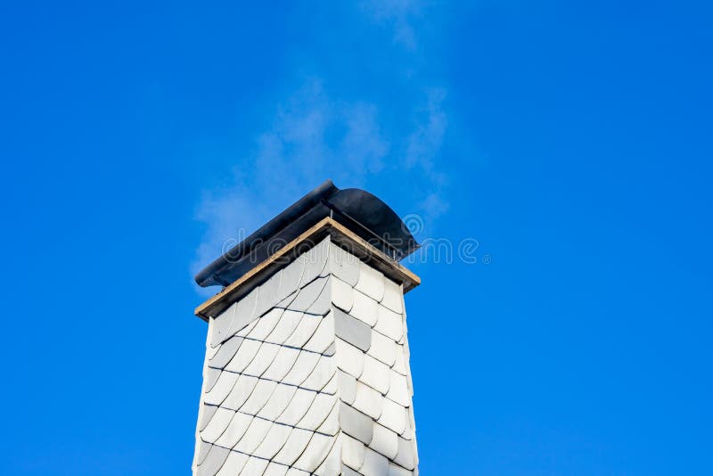 Smoke from a Chimney of a House Stock Image - Image of color, eaves ...