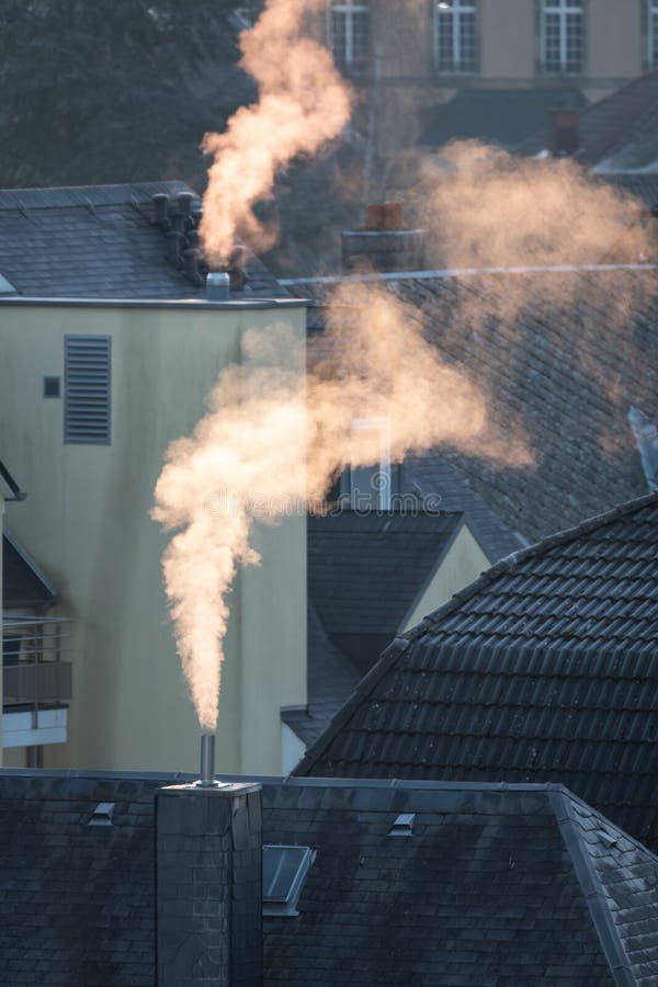 Smoke from Chimneys on Rooftops Stock Image - Image of house, ecology ...