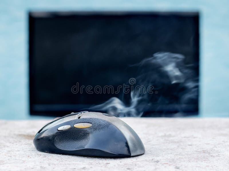 Smoke is Coming from the Computer Mouse Near the Computer Due To a ...