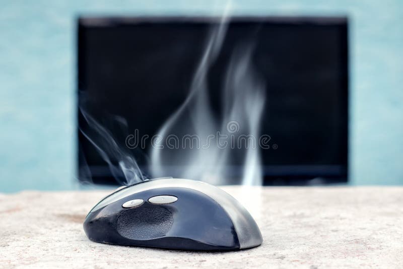Smoke is Coming from the Computer Mouse Near the Computer Due To a ...