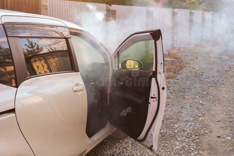 Smoke is Coming from Inside the Car. Stock Photo - Image of outdoors ...
