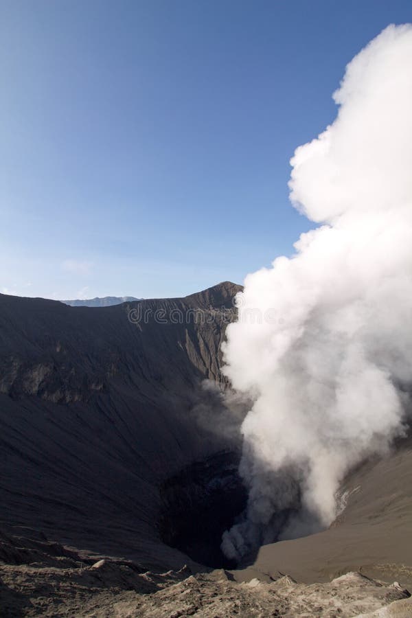 Smoke Coming Out of the Bromo Volcano Caldera Stock Photo - Image of ...